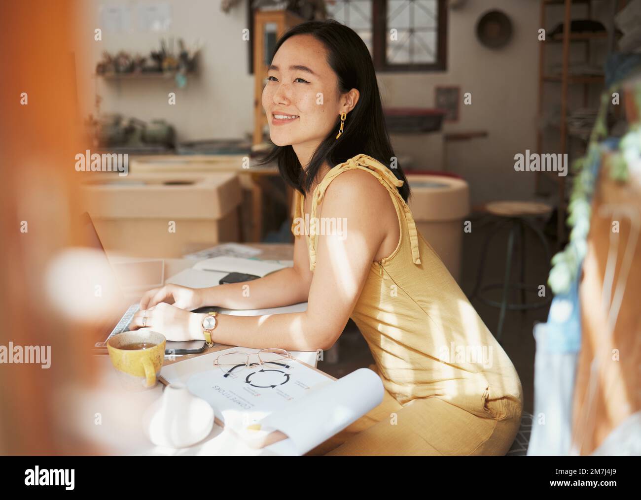 Business owner, Asian woman and thinking in workplace, smile and ...
