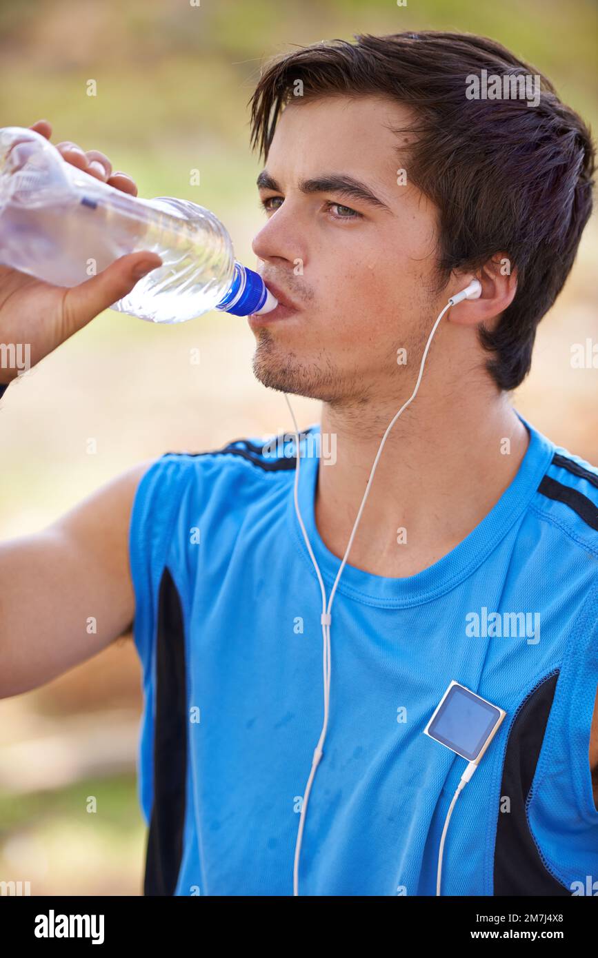Theres nothing like fresh air and exercise. a handsome young man taking ...