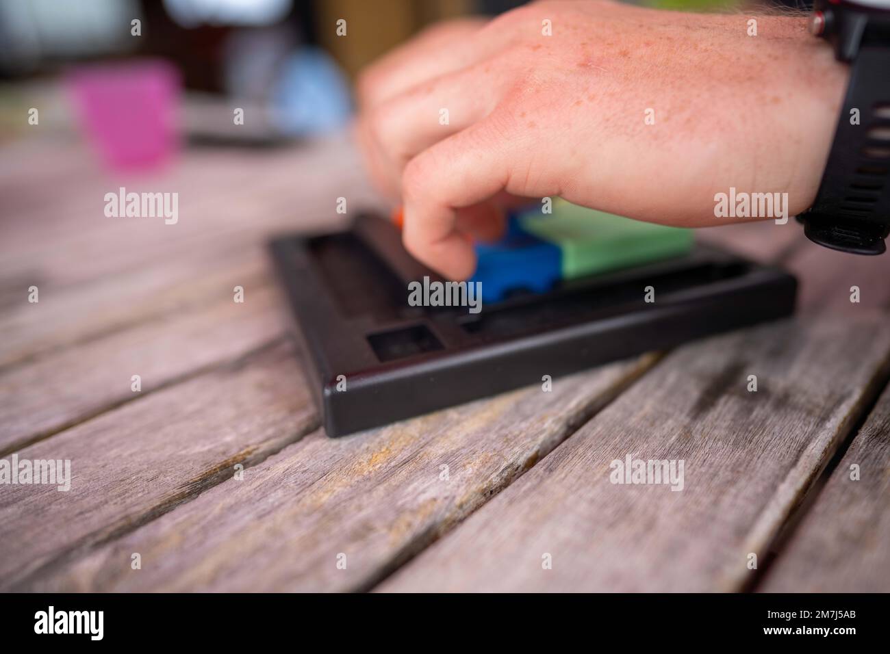 playing a puzzle game in the holidays with the family. block puzzle ...