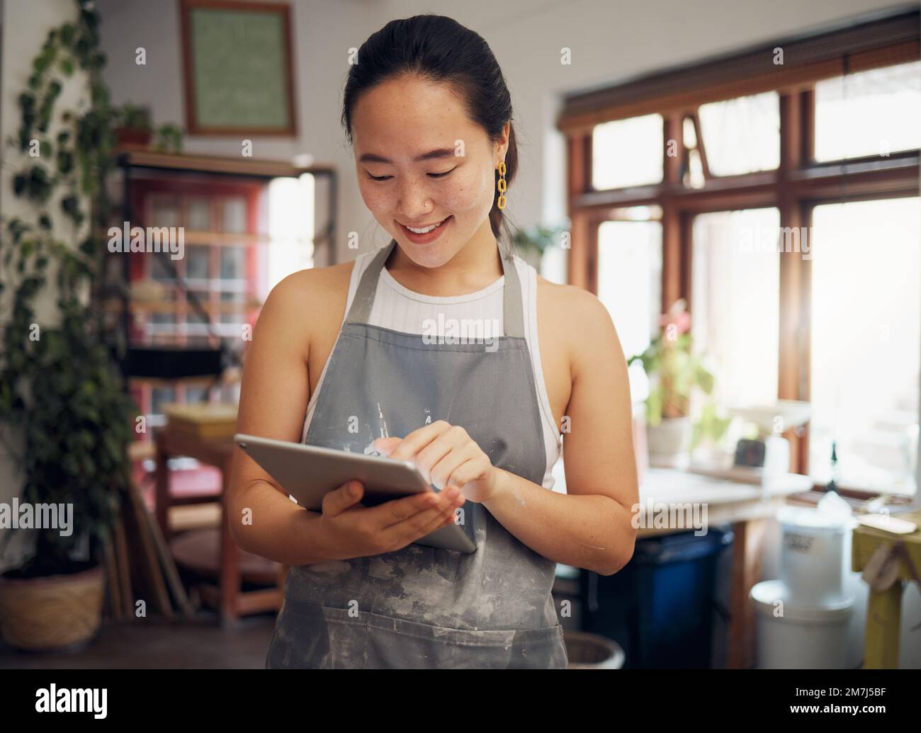 Business owner, Asian woman and tablet for connection, digital ...