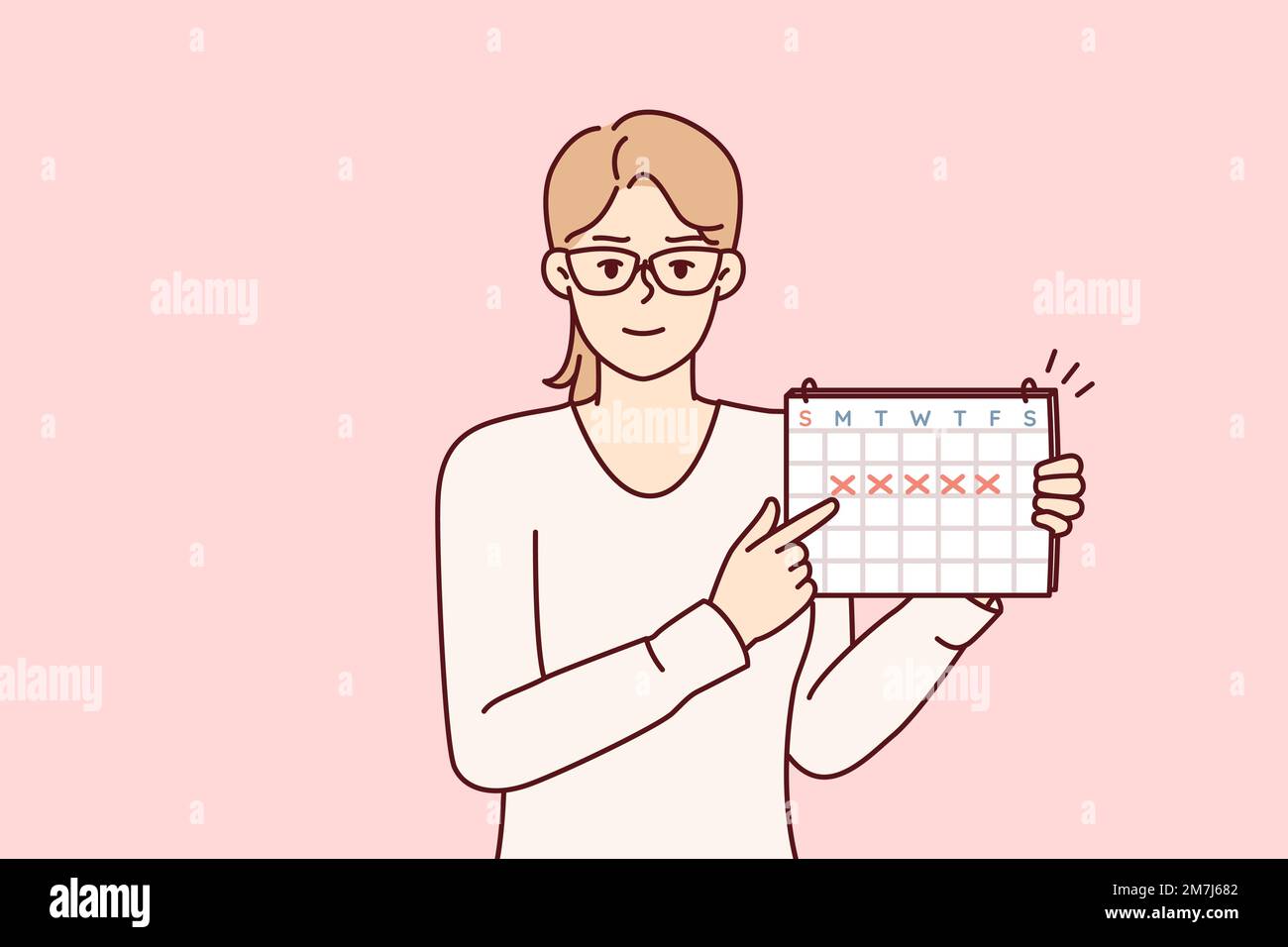 Young woman points finger at calendar with marks recommending time ...