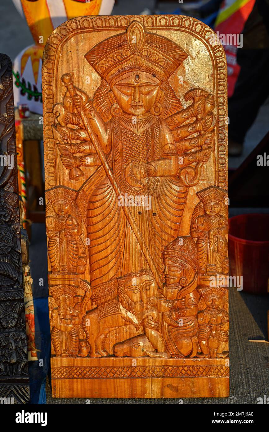 Beautiful handmade wooden sculpture of Goddess devi Durga is displayed ...