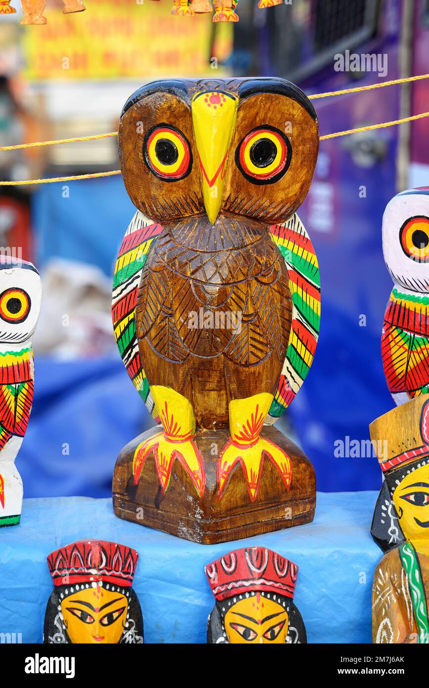 Beautiful handmade wooden toys owl shaped is displayed in a shop for ...