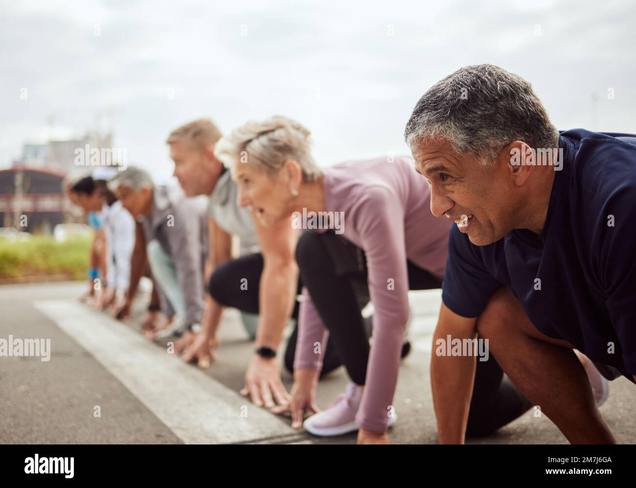 Start, fitness or senior people in a marathon race with running goals ...