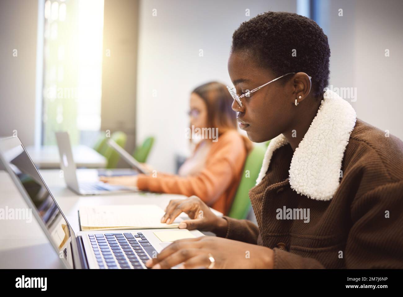 Education, black woman and laptop for studying, knowledge and learning ...