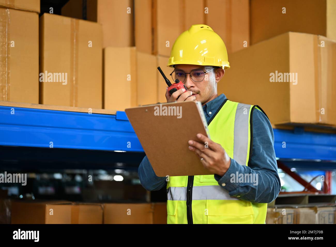 Warehouse manager wearing hard hat hi-res stock photography and images ...