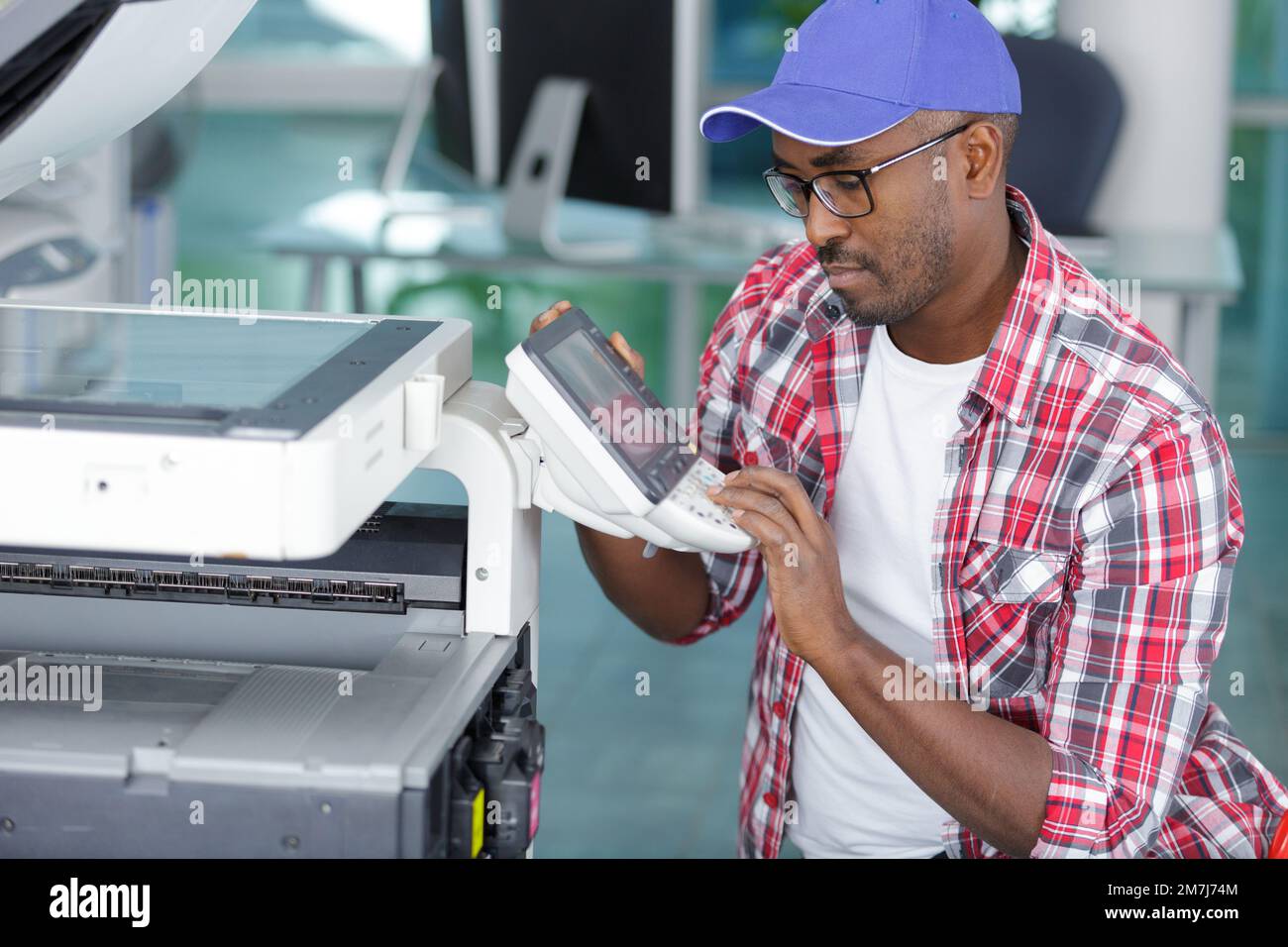 man is testing a printer Stock Photo - Alamy