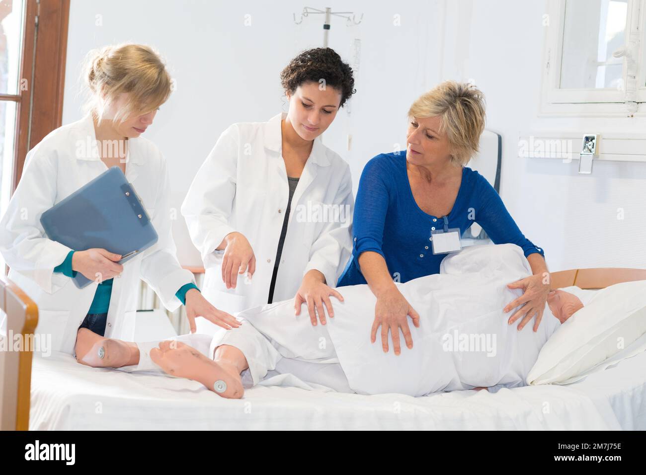 Doctors Working On Patient