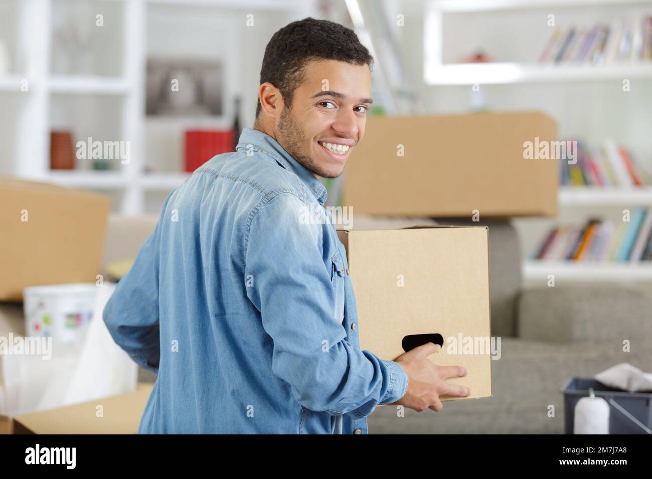 a happy man moving houses Stock Photo - Alamy