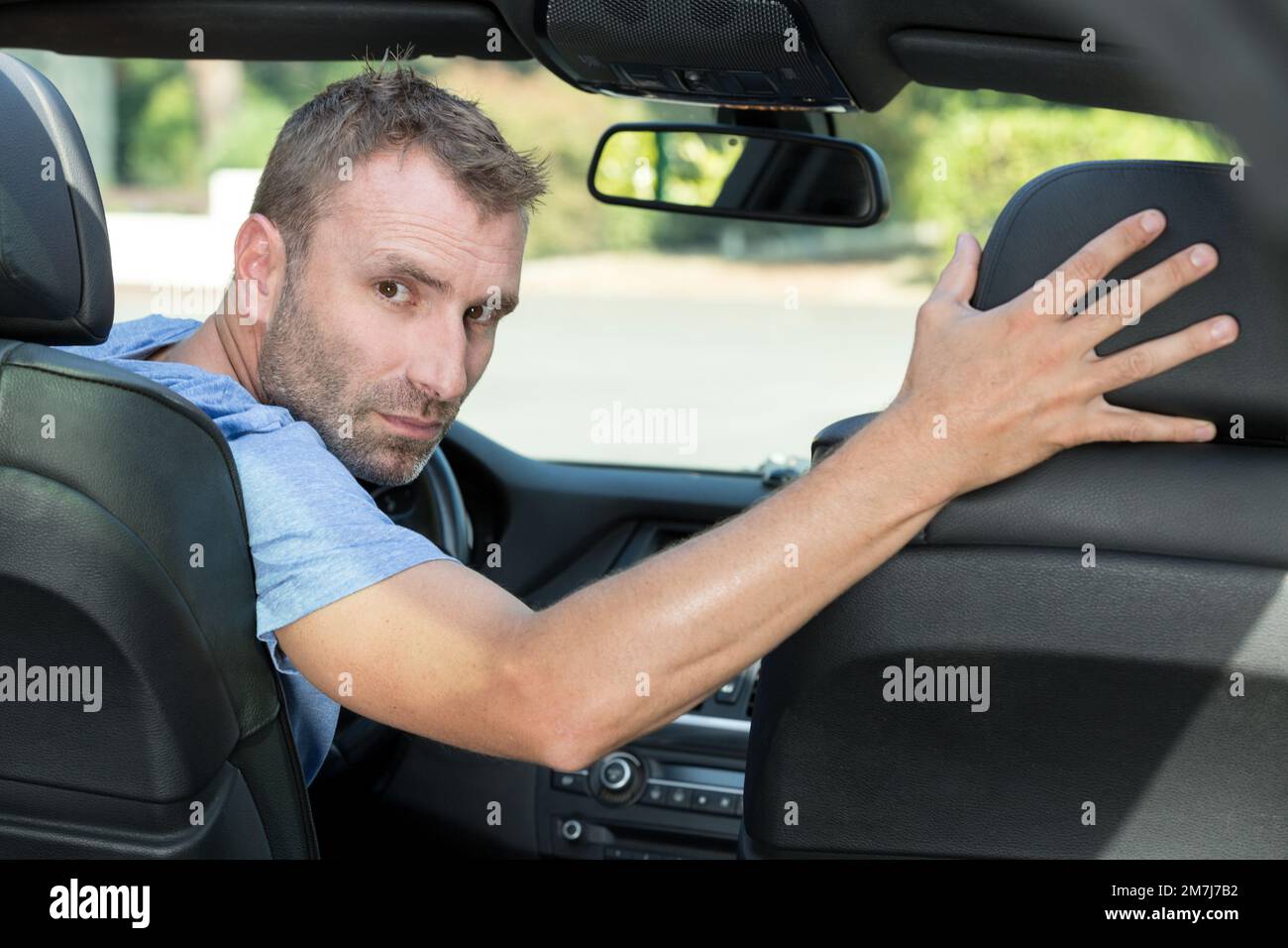 Reverse parking man hi-res stock photography and images - Alamy