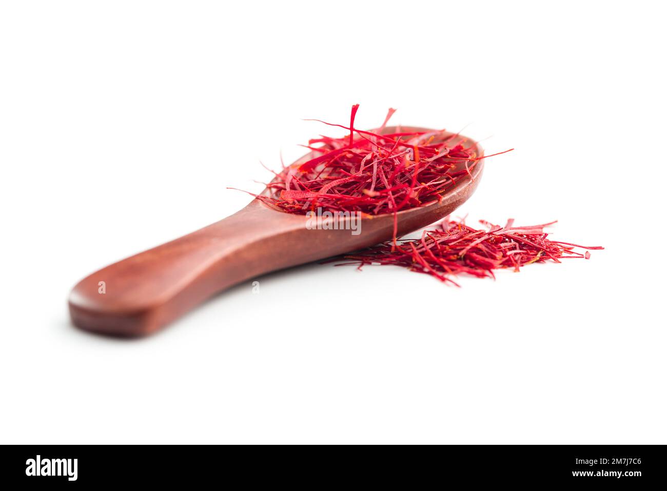 Dried saffron spice in spoon isolated on the white background Stock ...