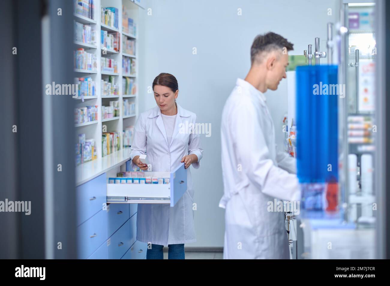 Mature pharmacist in lab hi-res stock photography and images - Alamy