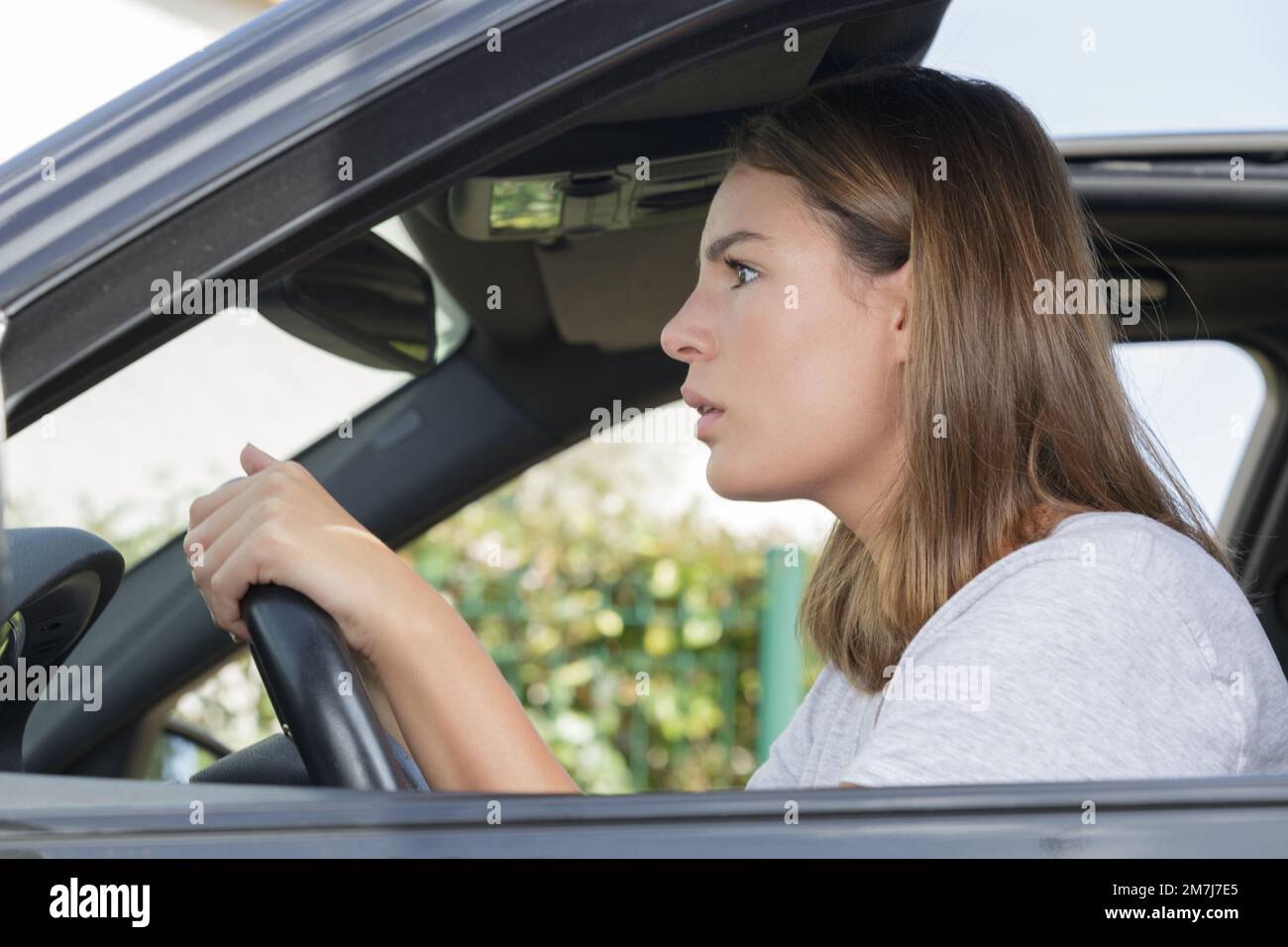 closeup shot of stressed young woman driver in a car Stock Photo - Alamy