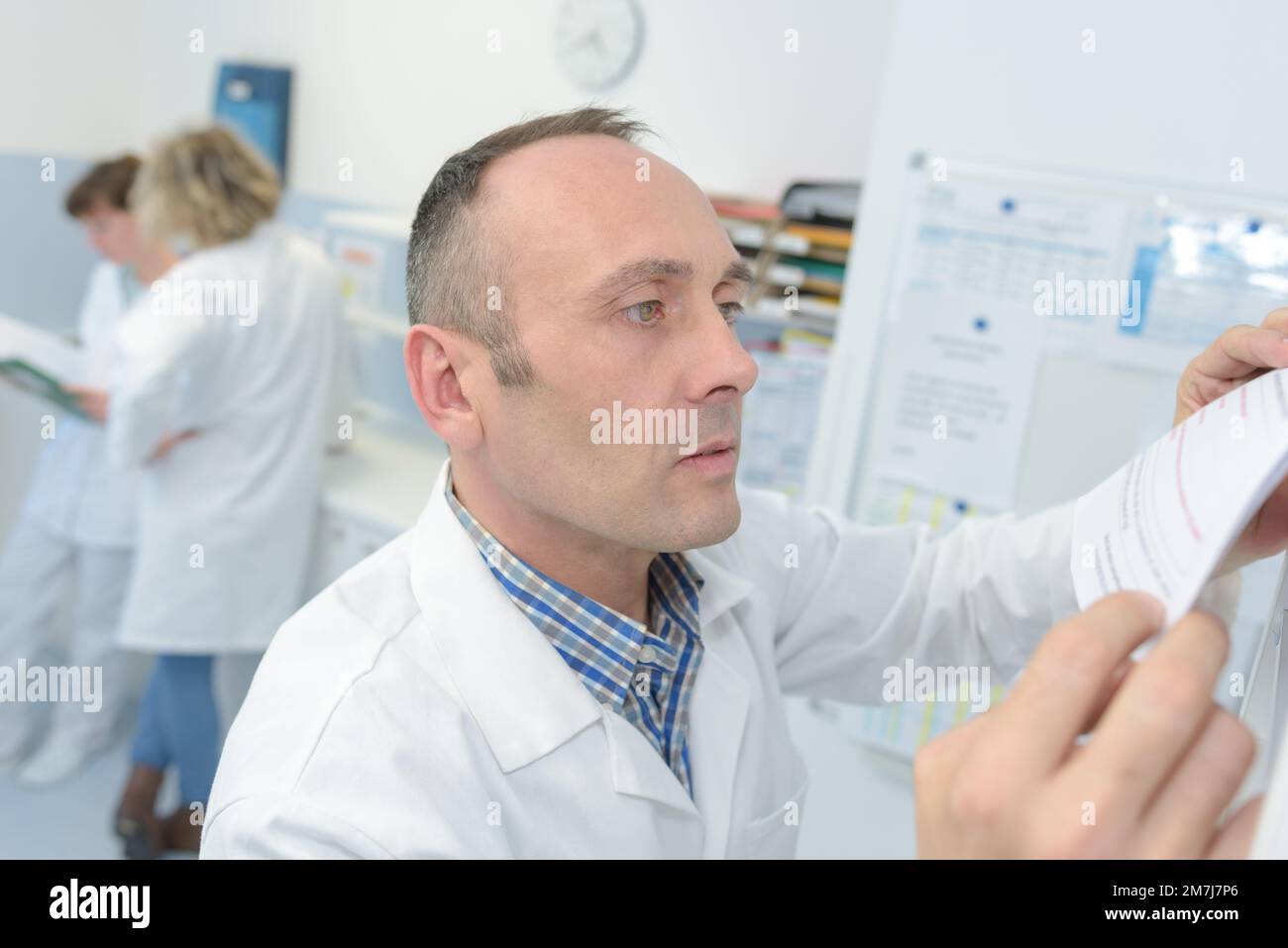Clinician paperwork hi-res stock photography and images - Alamy