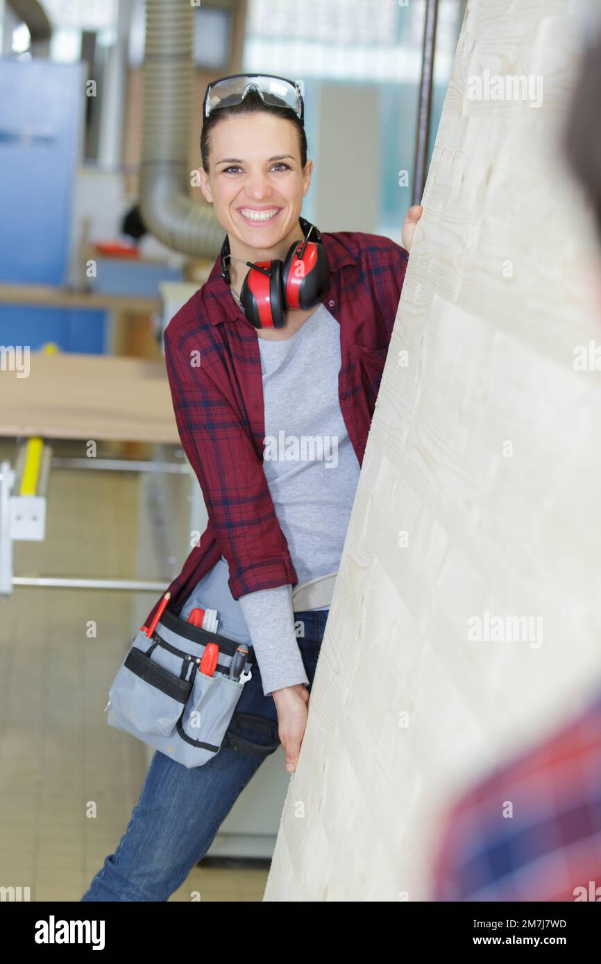 Female construction worker carry hi-res stock photography and images ...