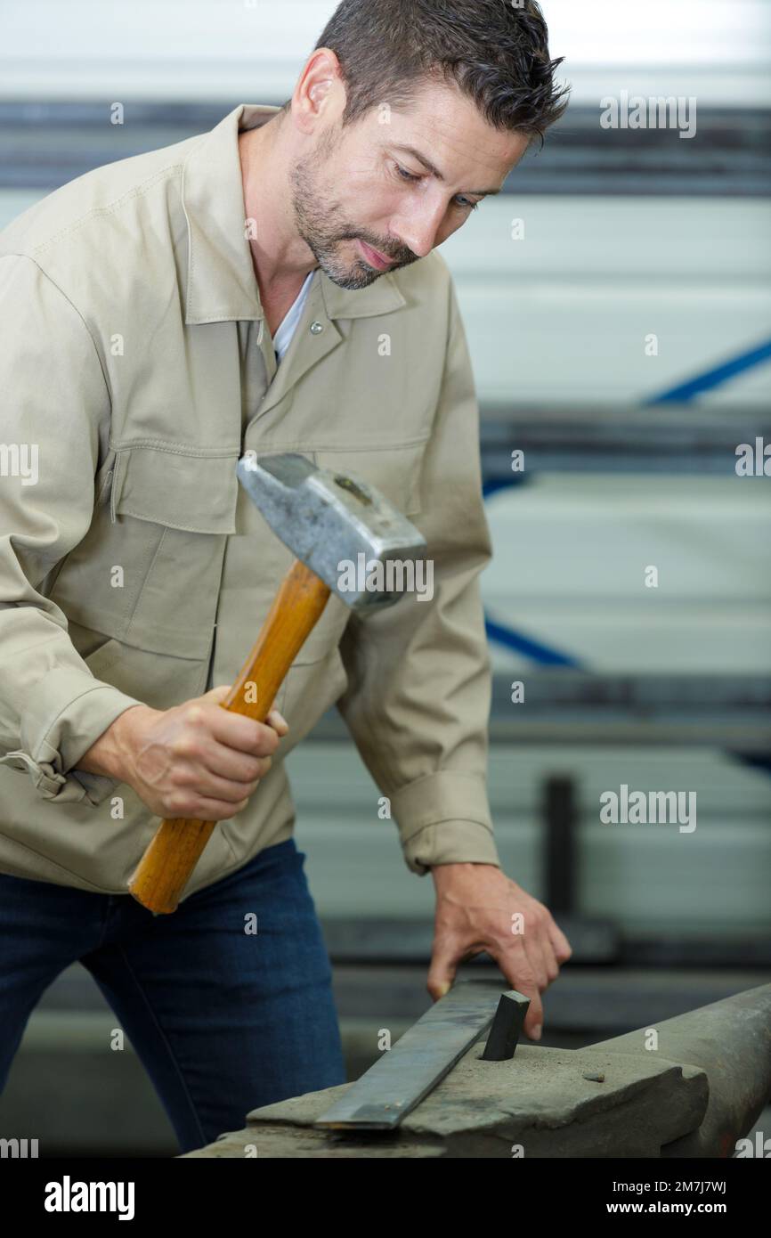 Hammering machine hi-res stock photography and images - Alamy