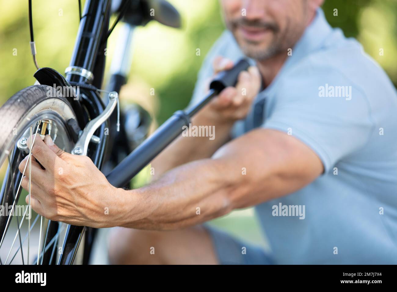 Close up male hand pumping hi-res stock photography and images - Alamy