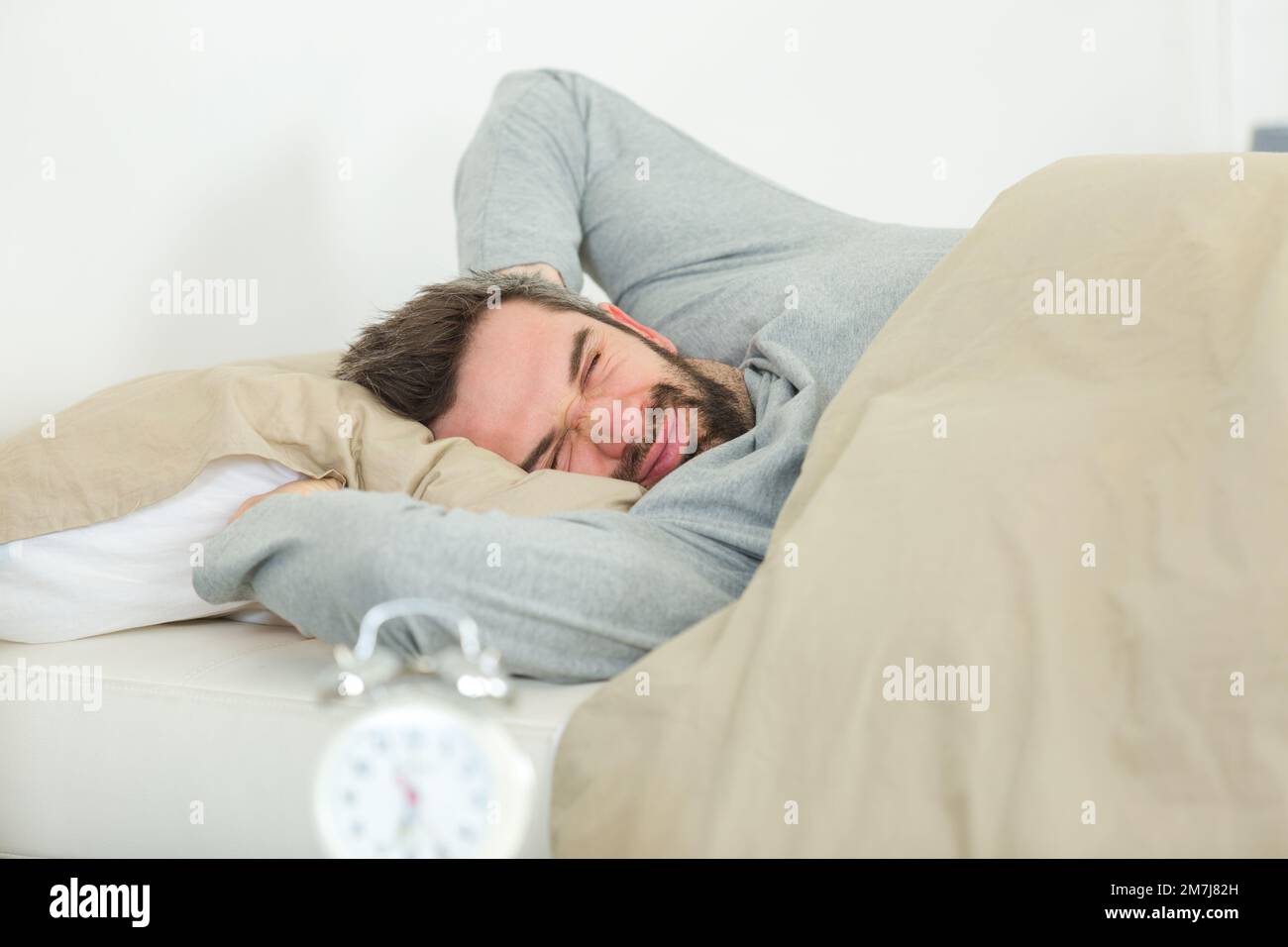 man suffering from bad case of insomnia Stock Photo - Alamy