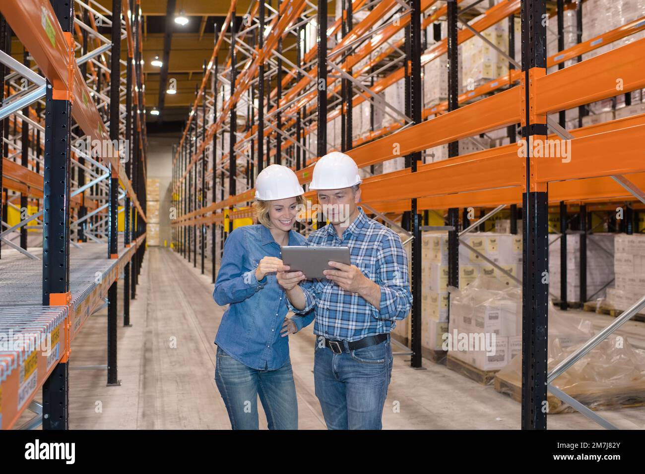 production delivery staffs in the warehouse Stock Photo - Alamy