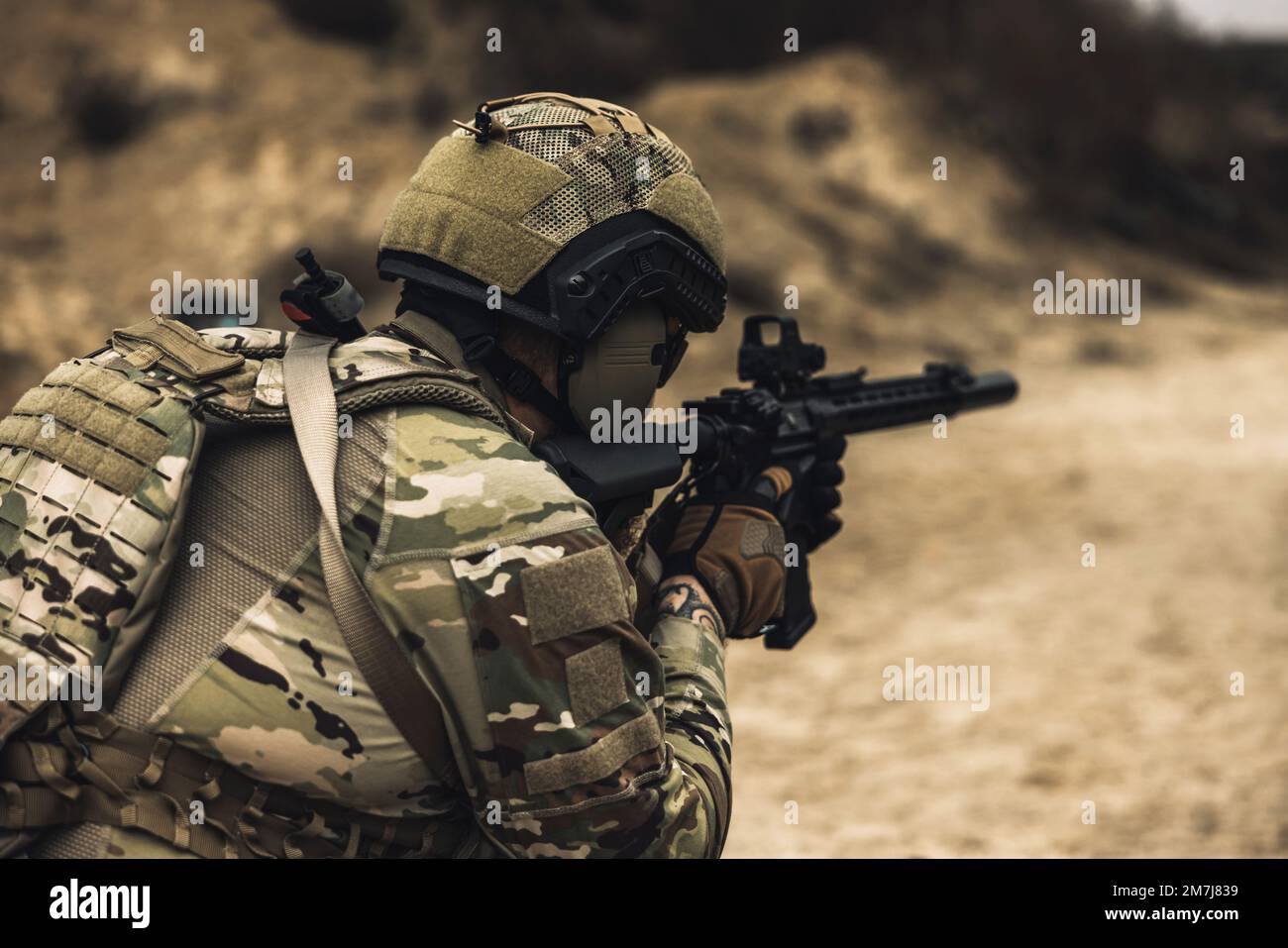 Sniper with rifle on a position Stock Photo - Alamy