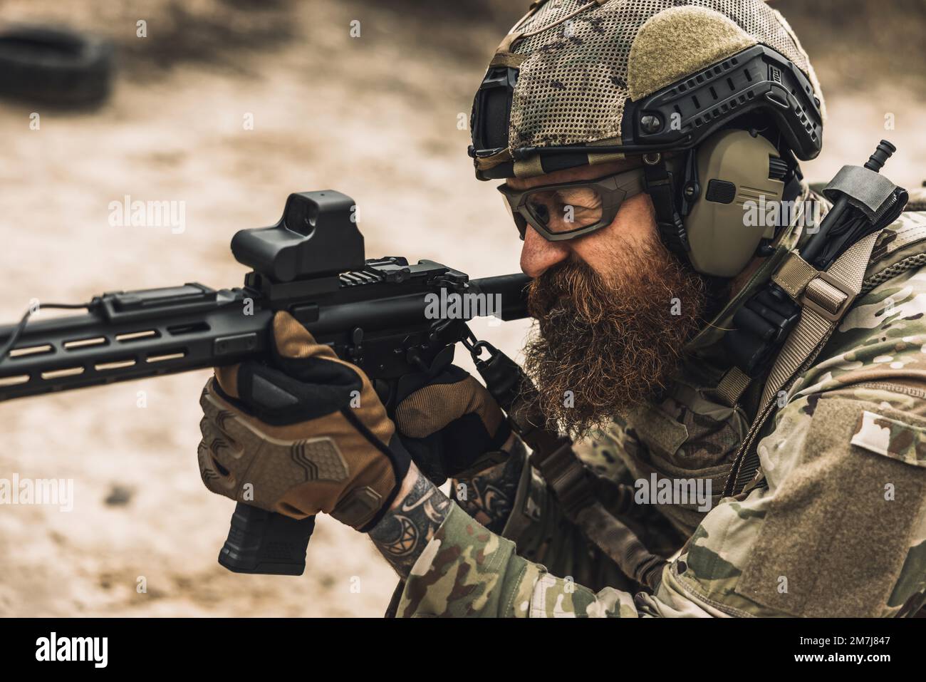 Sniper with rifle on a position Stock Photo - Alamy