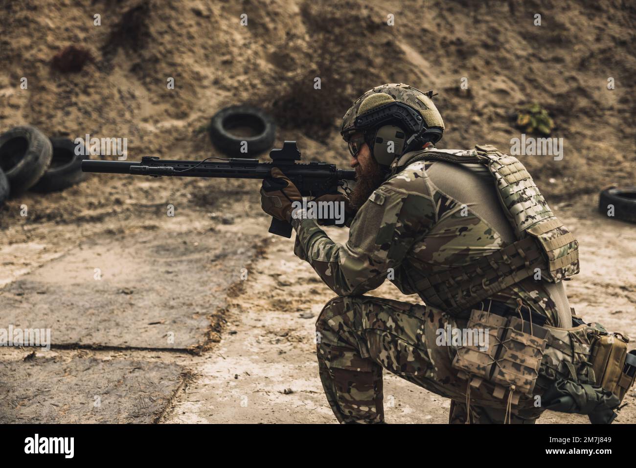 Sniper with rifle on a position Stock Photo - Alamy