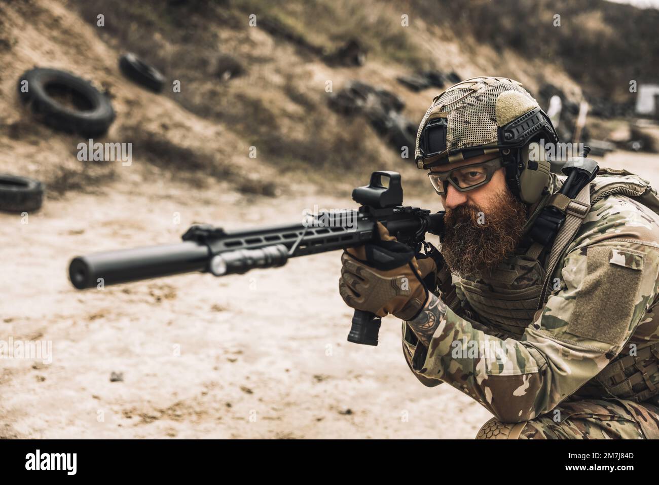 Sniper with rifle on a position Stock Photo - Alamy