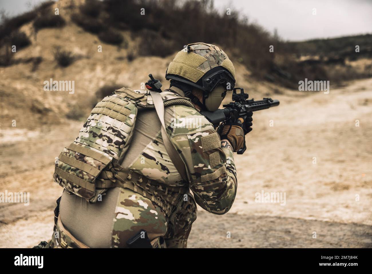 Sniper with rifle on a position Stock Photo - Alamy
