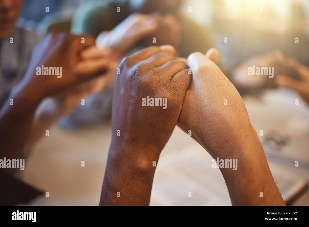 Prayer, holding hands, and group of Christian people with hope, support ...