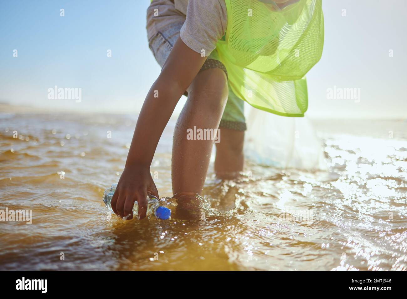 Plastic bottle, cleaning ocean and kid with environment and climate ...