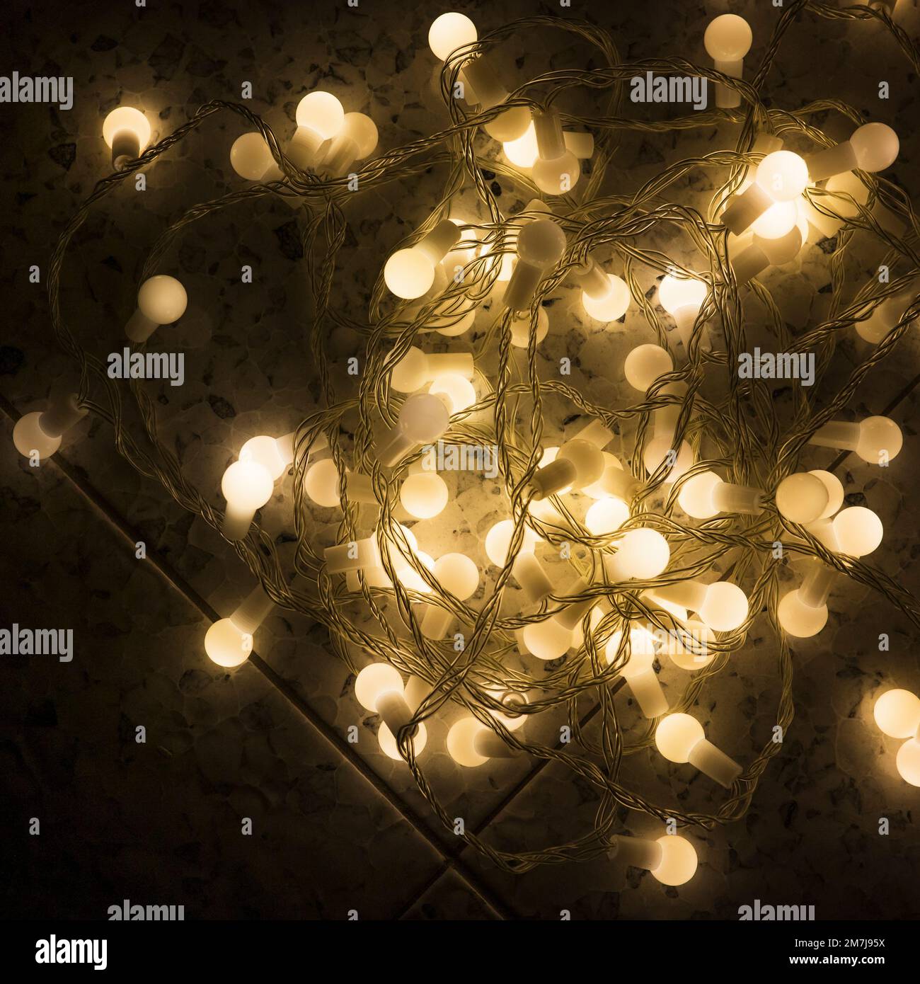 Celebration yellow light bulbs Stock Photo - Alamy