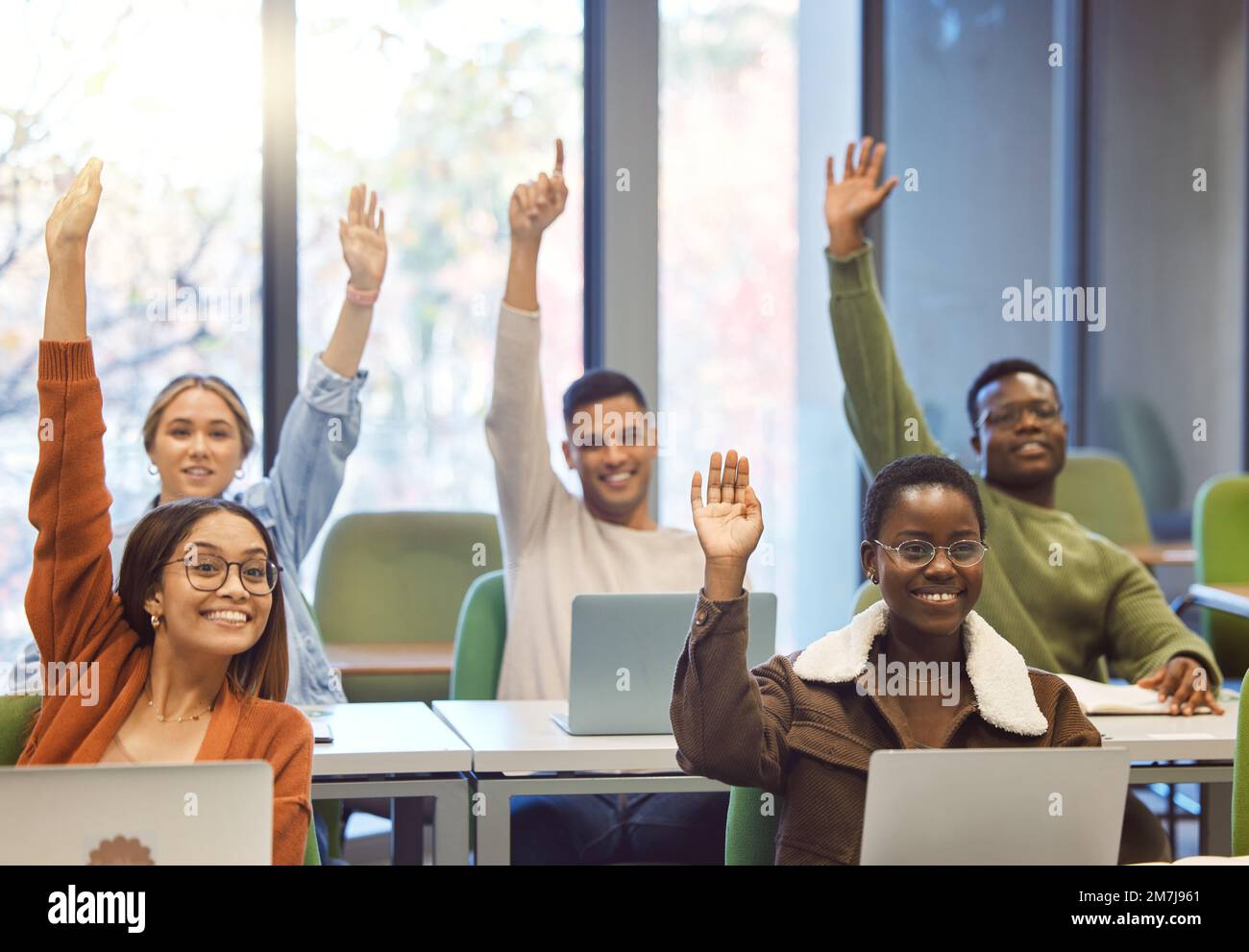 Learning, class and education with student, question with hand raised ...