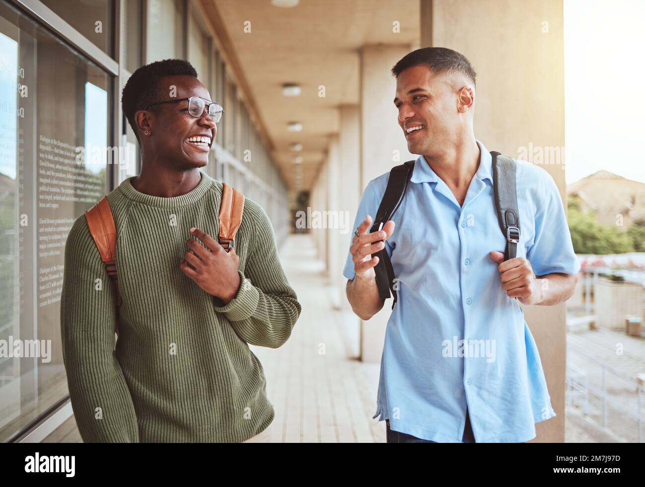 Men, students and friends with education and university, together ...
