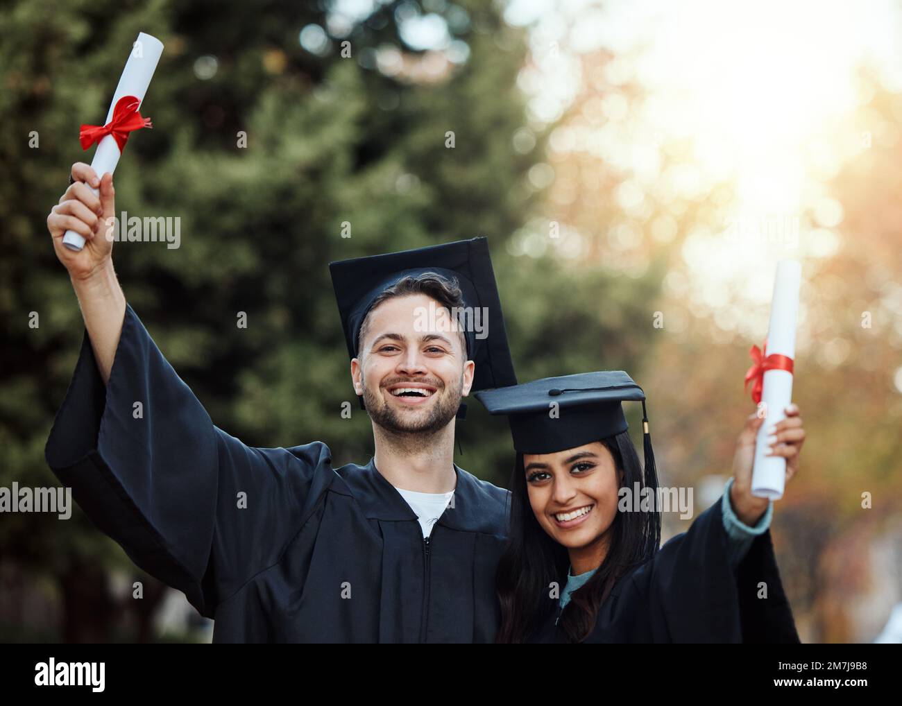 Education, graduation and celebration, portrait of couple with ...