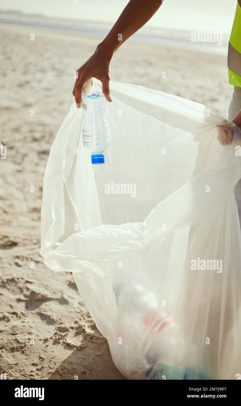 Cleaning, plastic and hands of volunteer at beach for recycle ...