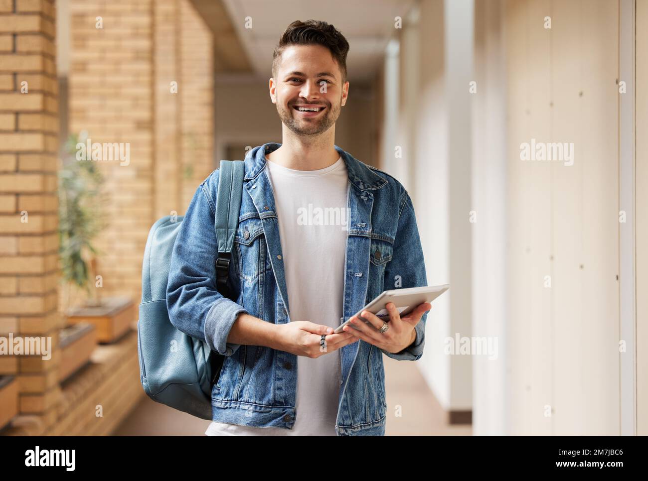 University portrait and man student with tablet for academic learning ...