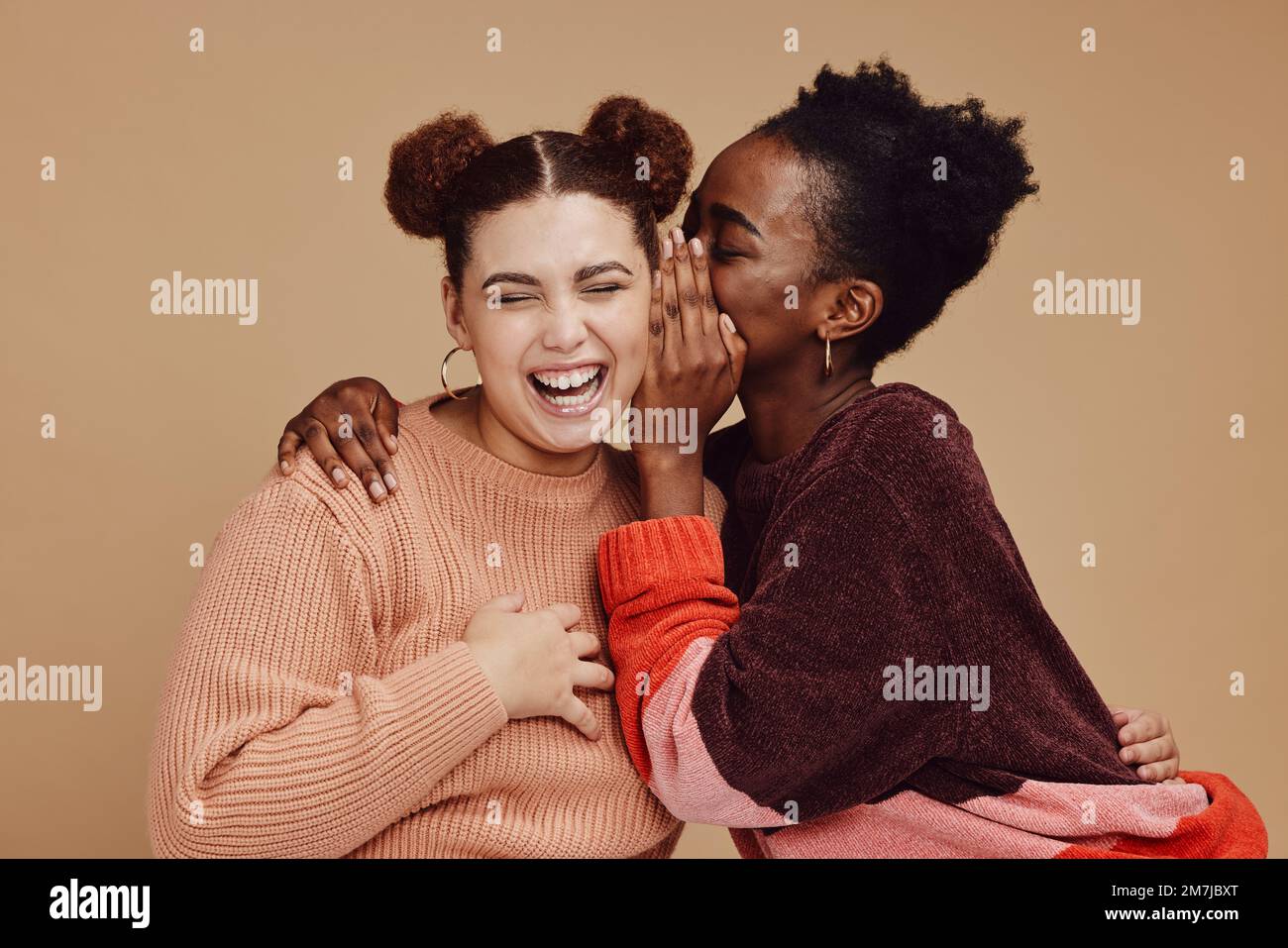 Friends, gossip and women laughing at secret joke on studio background ...