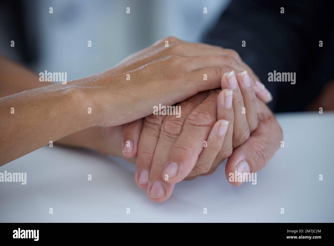Hands, care and love with a business woman consoling or comforting a ...