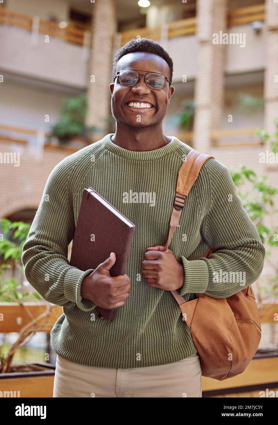 Campus, student and portrait of black man at college building, academy ...