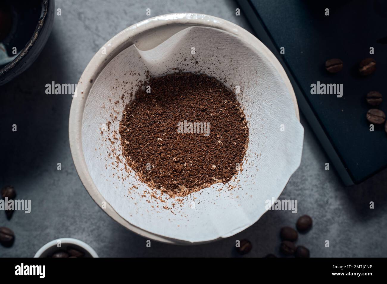 coffee powder in the dripper for make coffee filter on scales Stock ...