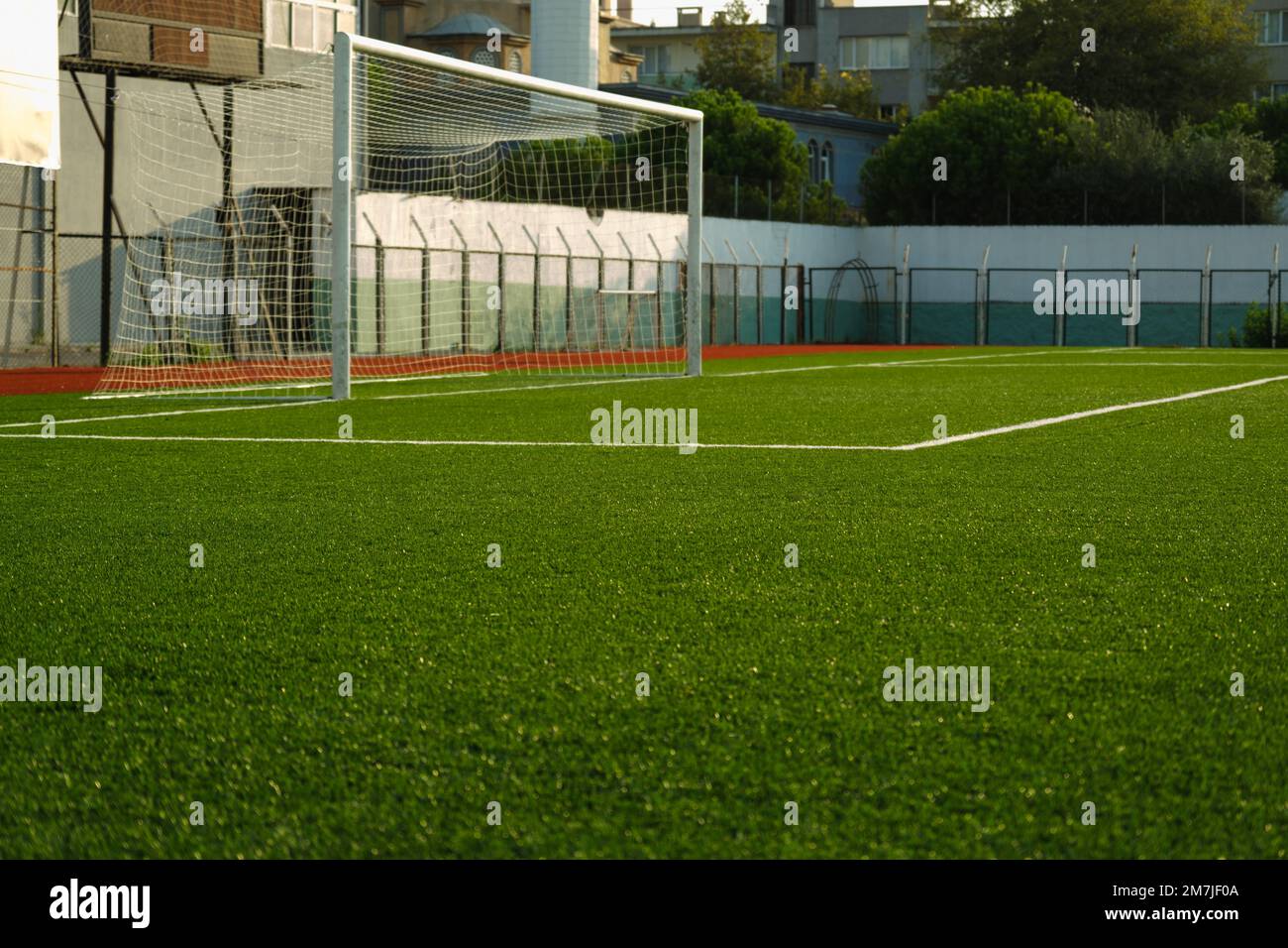 Close up shot of a football pitch with artificial grass Stock Photo - Alamy