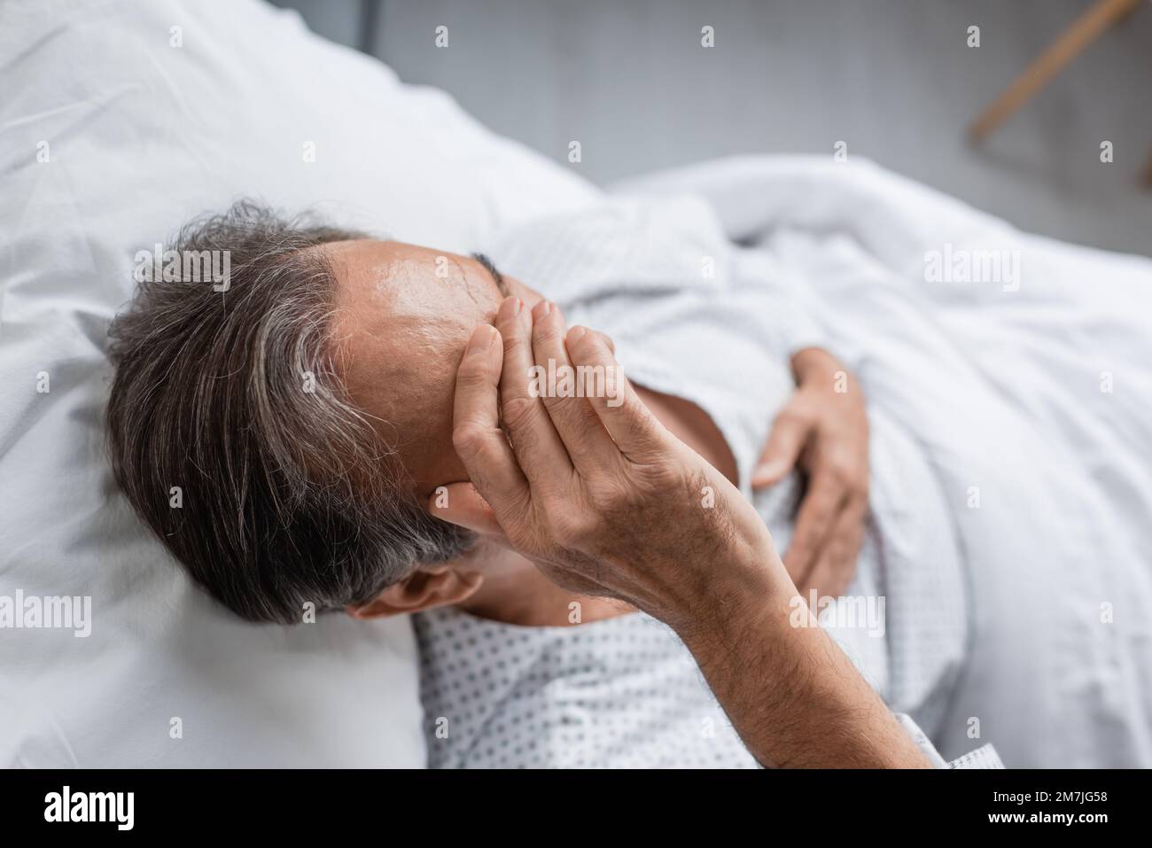 Elderly man hospital bed hi-res stock photography and images - Alamy