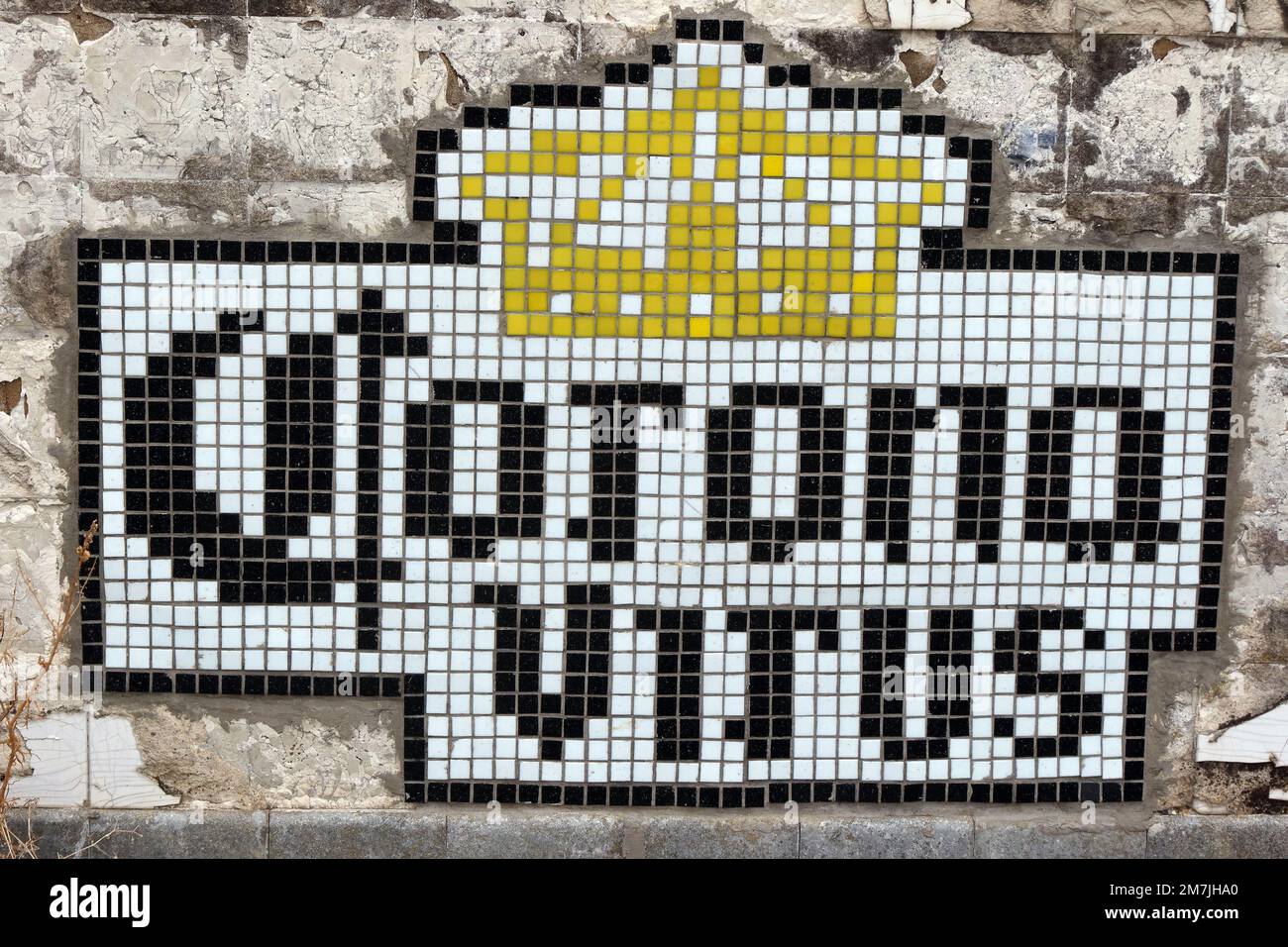 Mosaic of Corona Virus in a Corona lager logo, seen in Cheltenham town ...