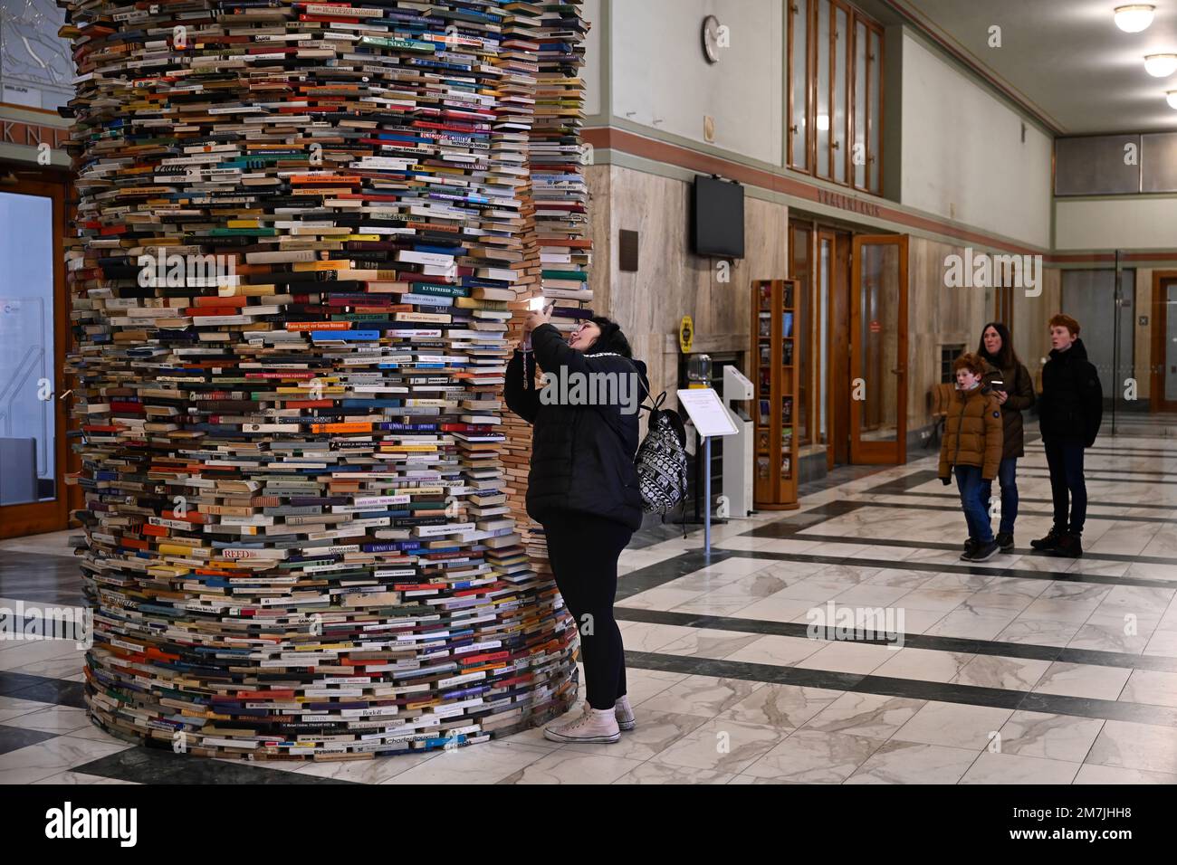 Idiom, a column made of 8,000 books in the vestibule of the Central ...