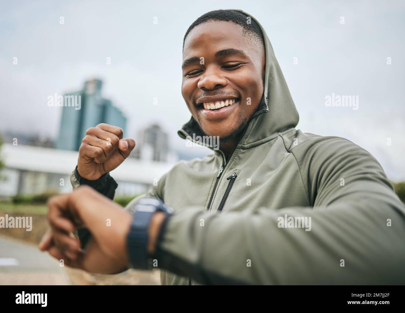 Fitness, goal and black man reading watch for training progress ...