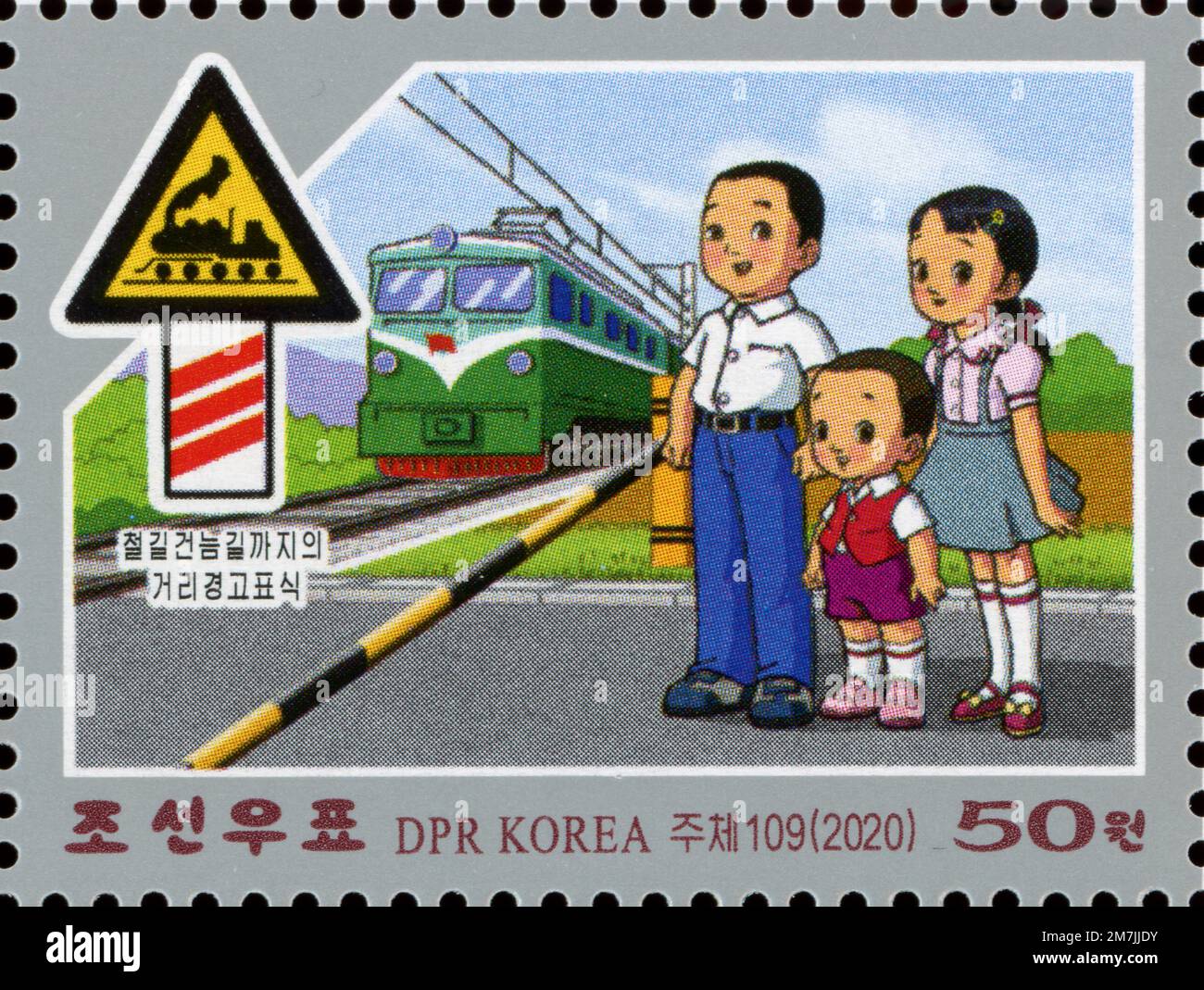 2020 North Korea stamp. Traffic rules. Railway crossing Stock Photo - Alamy