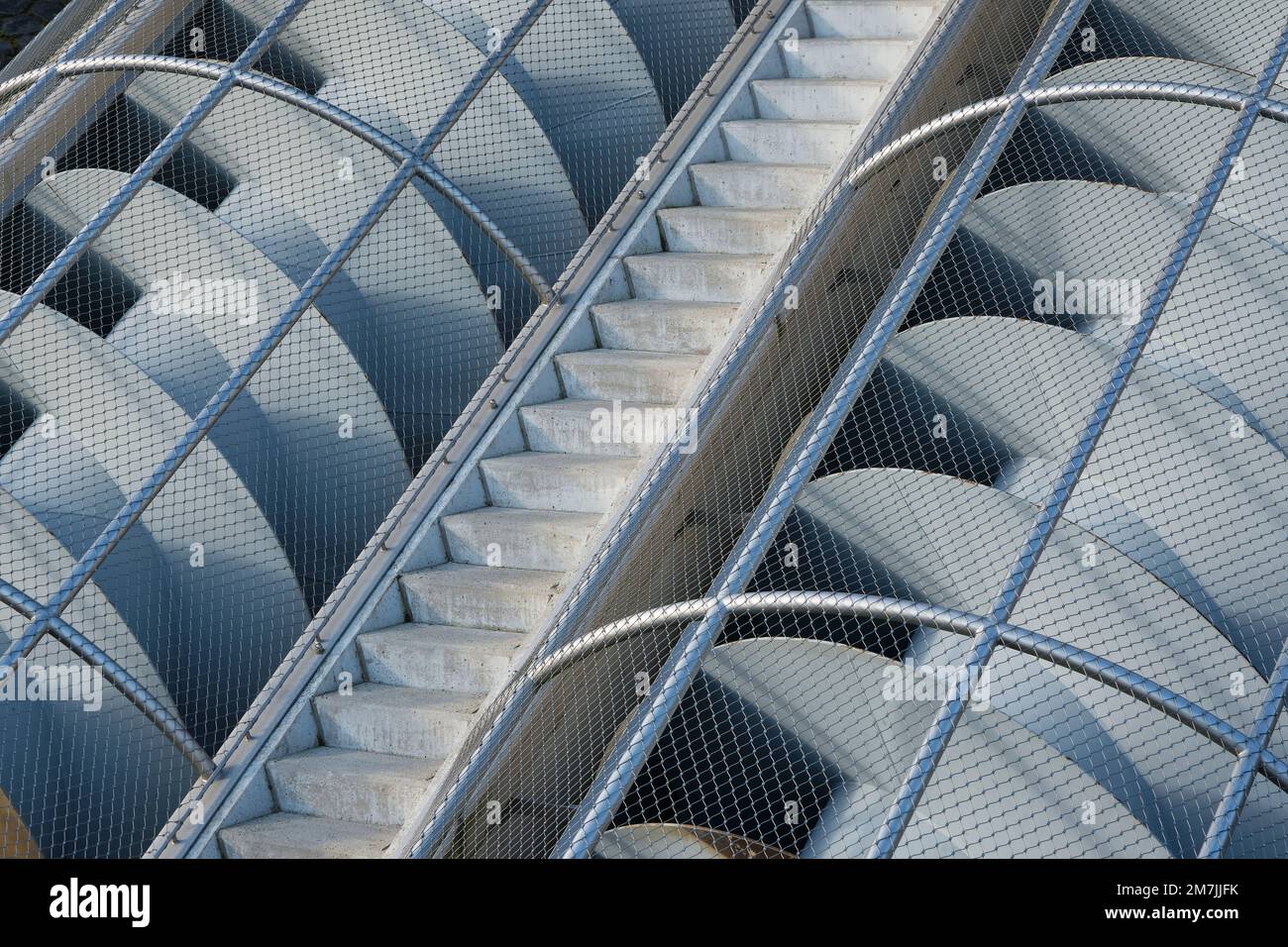 Closeup of grey metal screw pumps to pump water from low to high. Also ...
