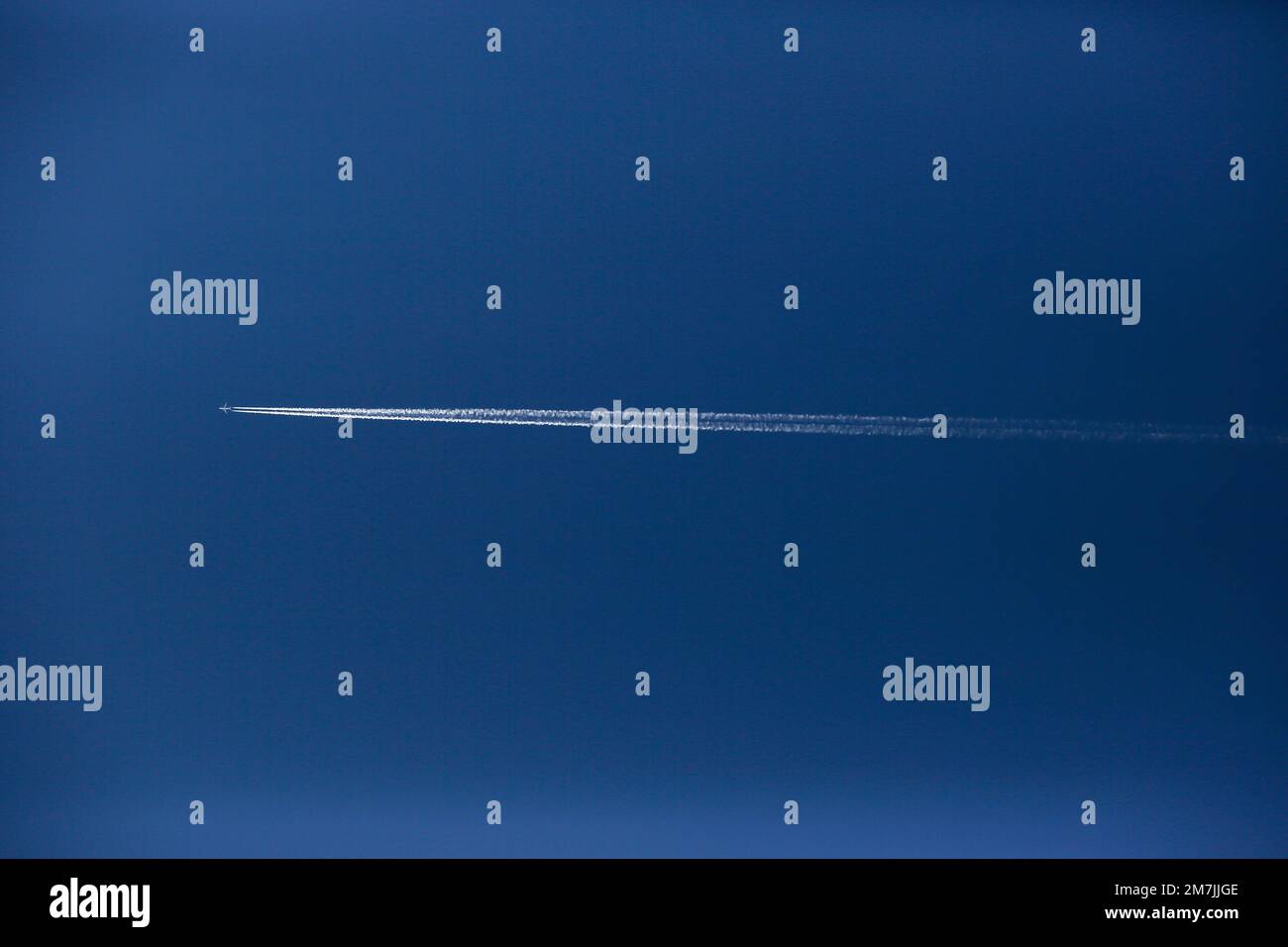 Blue sky with trails hi-res stock photography and images - Alamy