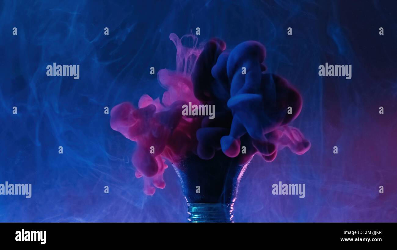 Color fume paint splash smoke broken light bulb Stock Photo - Alamy