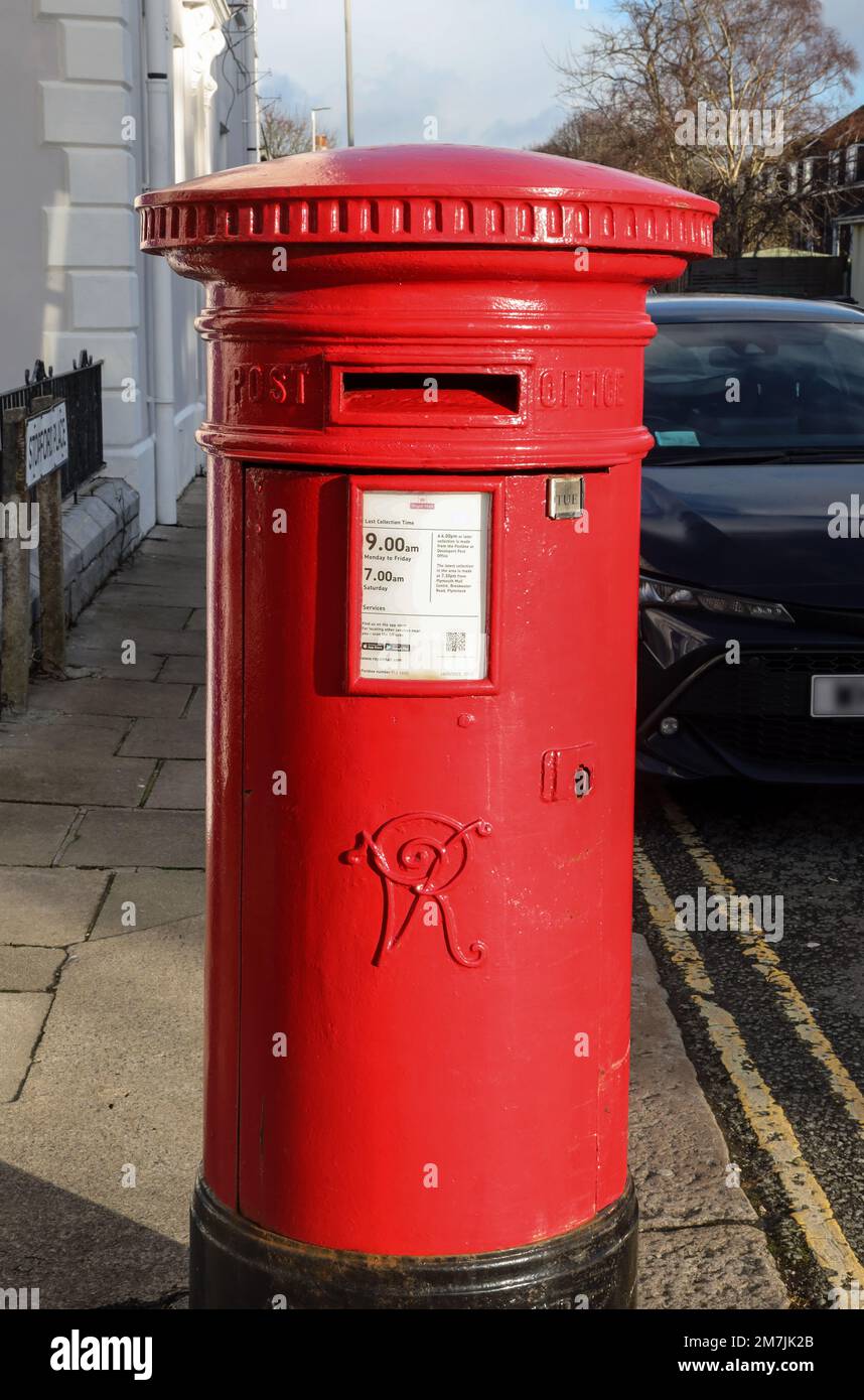 A bright red pillar box with the VR insignia at the corner of Exmouth ...